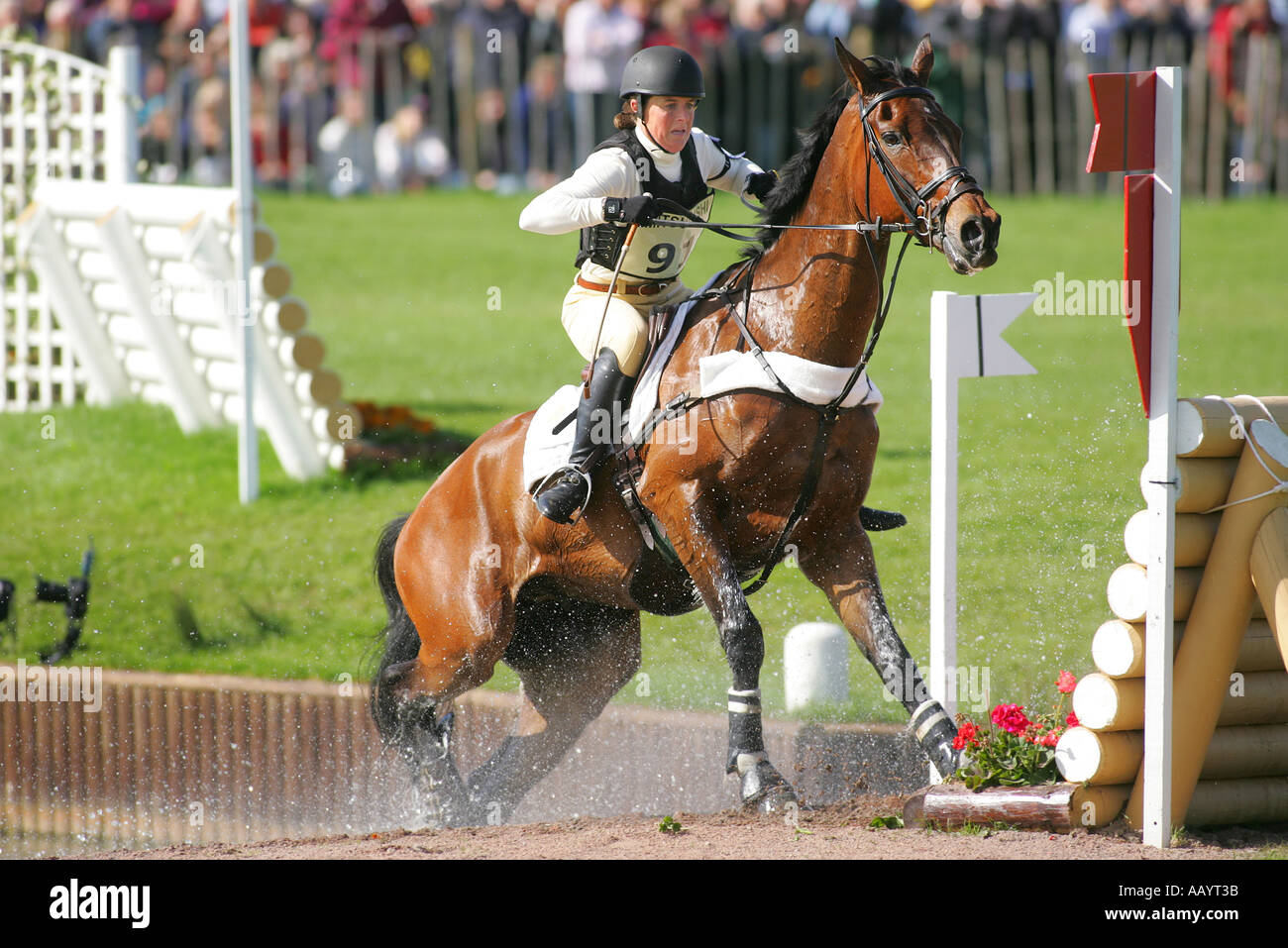 Champion Pippa Funnell rides Primmore s Pride through the lake at ...