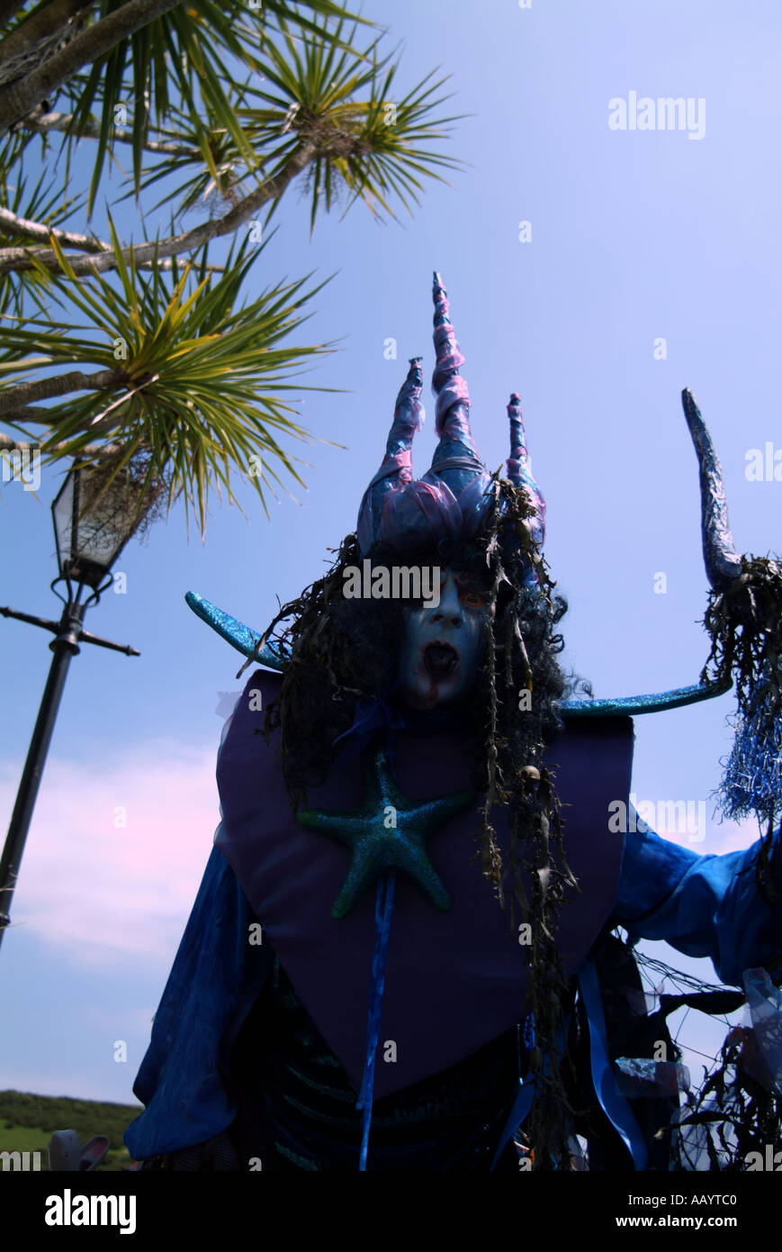 A street performer dressed as Neptune Salcombe Devon UK Stock Photo - Alamy