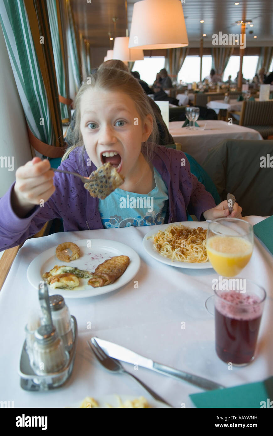 Hungry girl having lunch hi-res stock photography and images - Alamy