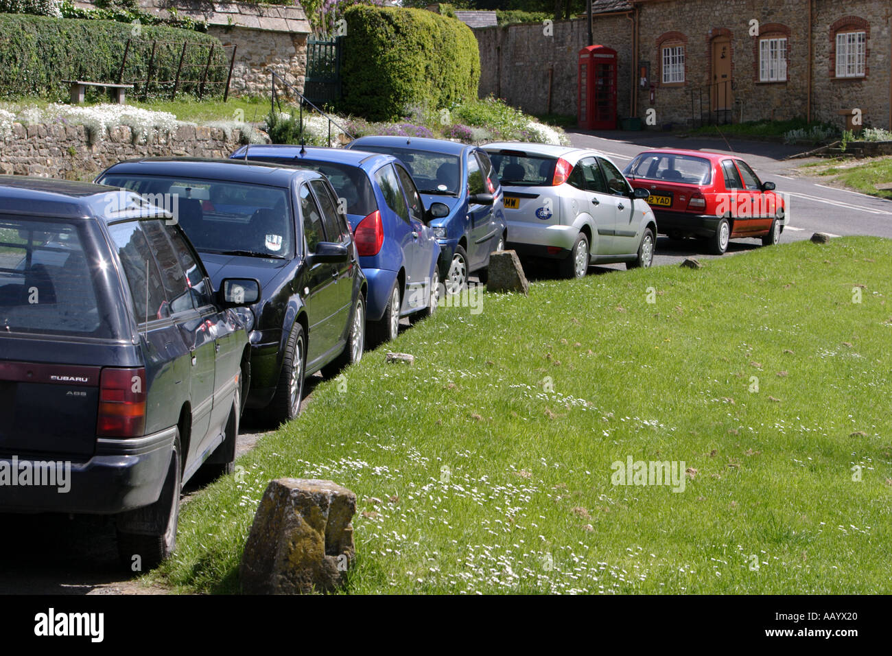 Rural car parking problem and congestion around village green Stock ...