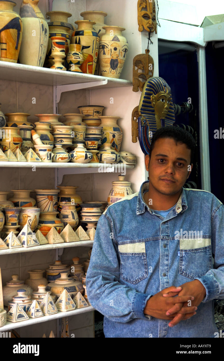 Egyptian shop holder in front of business for gifts Ed Dahar region ...