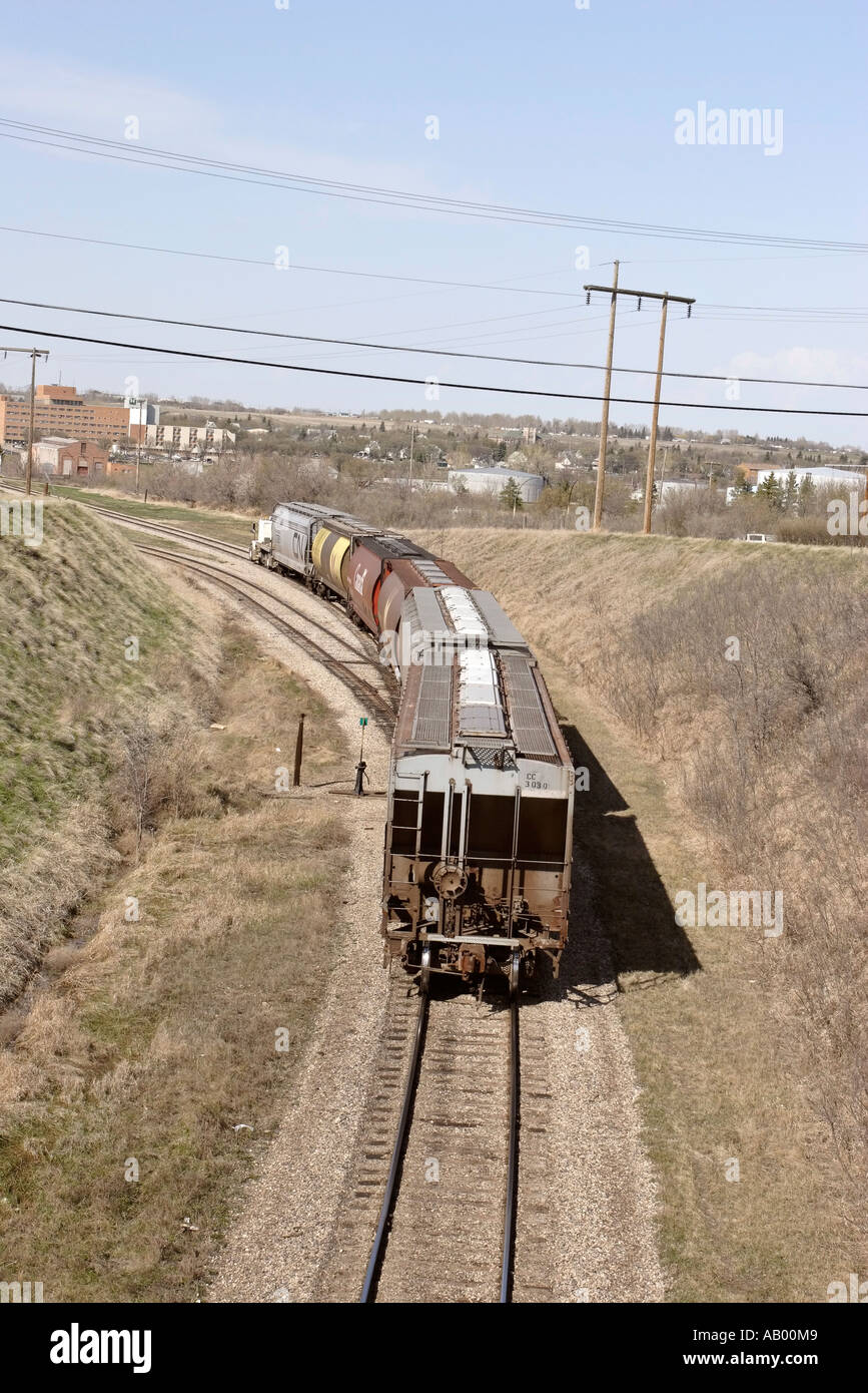 CNR truck pulling grain railcars through Moose Jaw in scenic ...