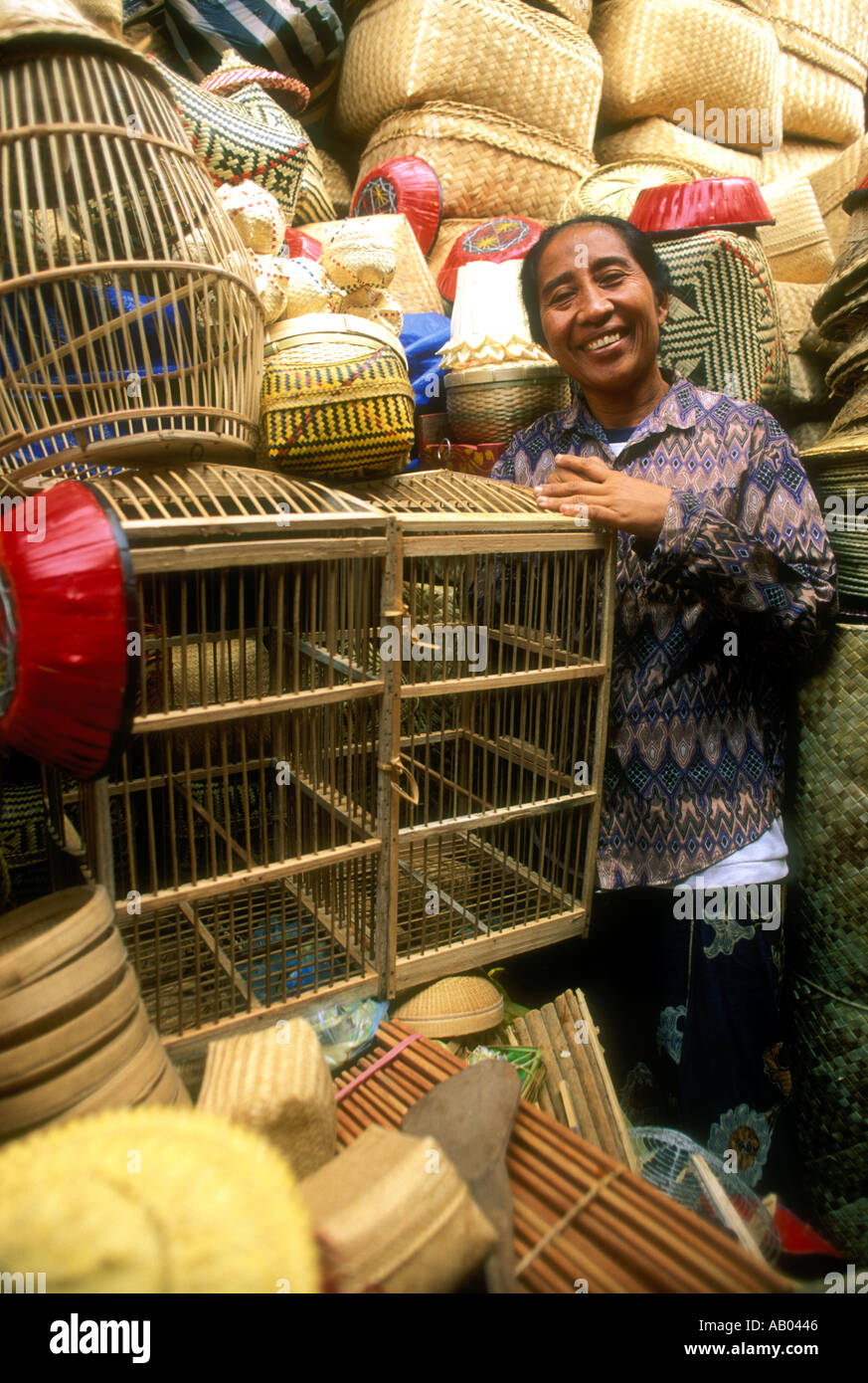 Woman selling baskets in public market on the island of Bali in ...