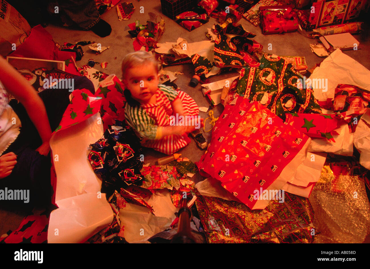 Mess christmas presents wrapping paper hi-res stock photography and ...