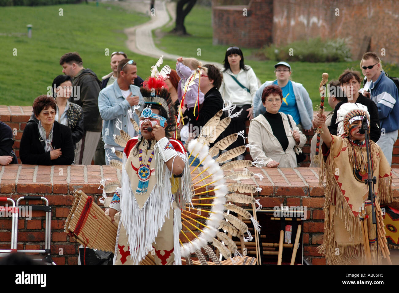 Indian show dancing and singing on the street in Warsaw playing for ...