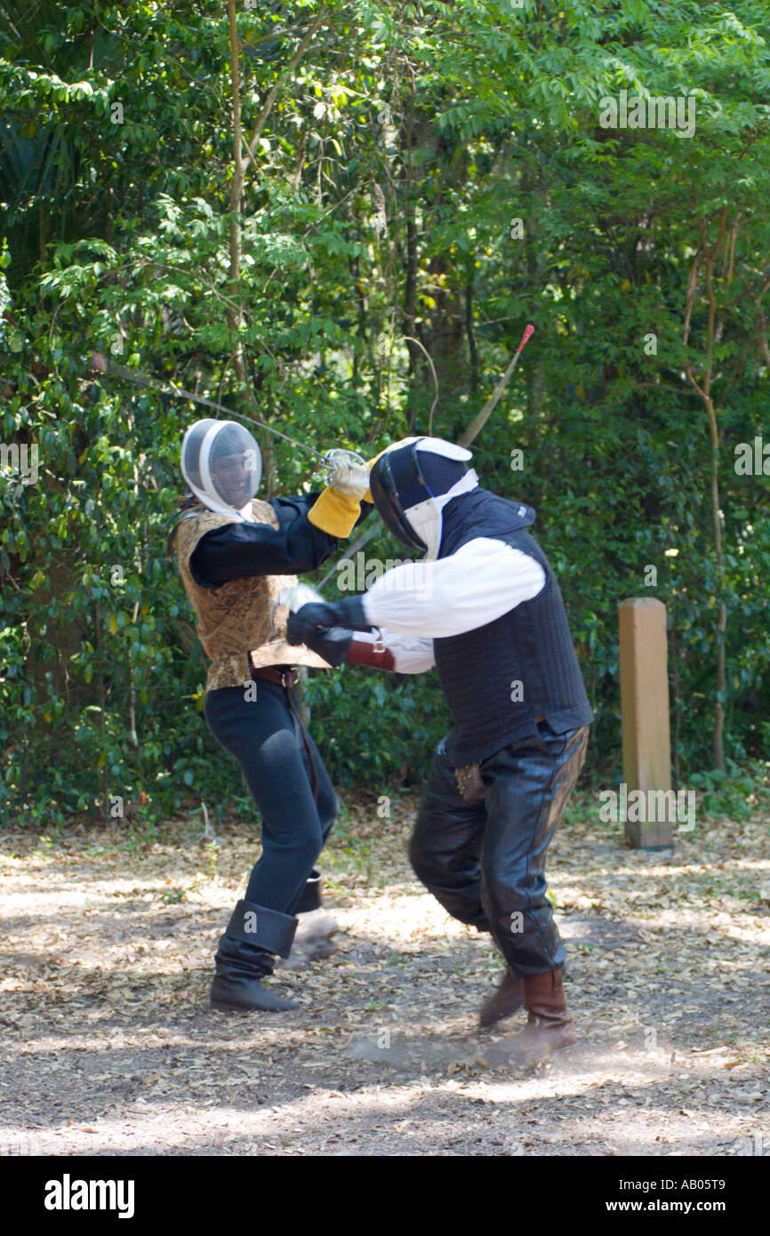 Actors fencing during a renaissance demonstration at homeschool outing ...