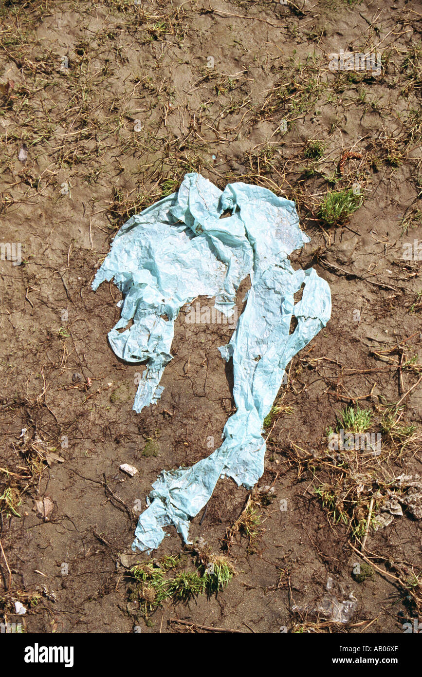 rotting blue plastic bag in mud Stock Photo - Alamy