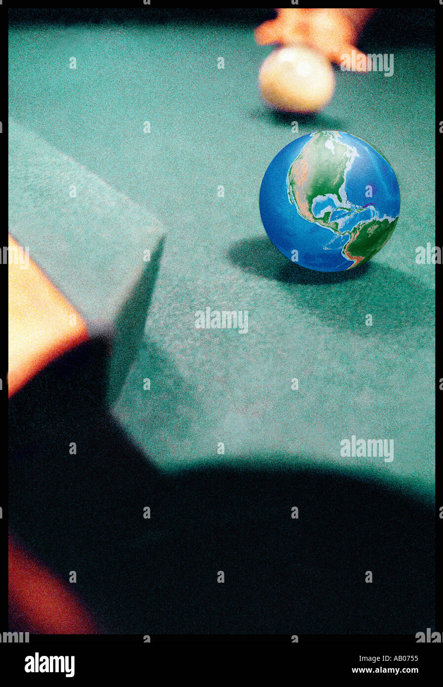 View from corner pocket of a person hand with pool cue aiming the cue ...