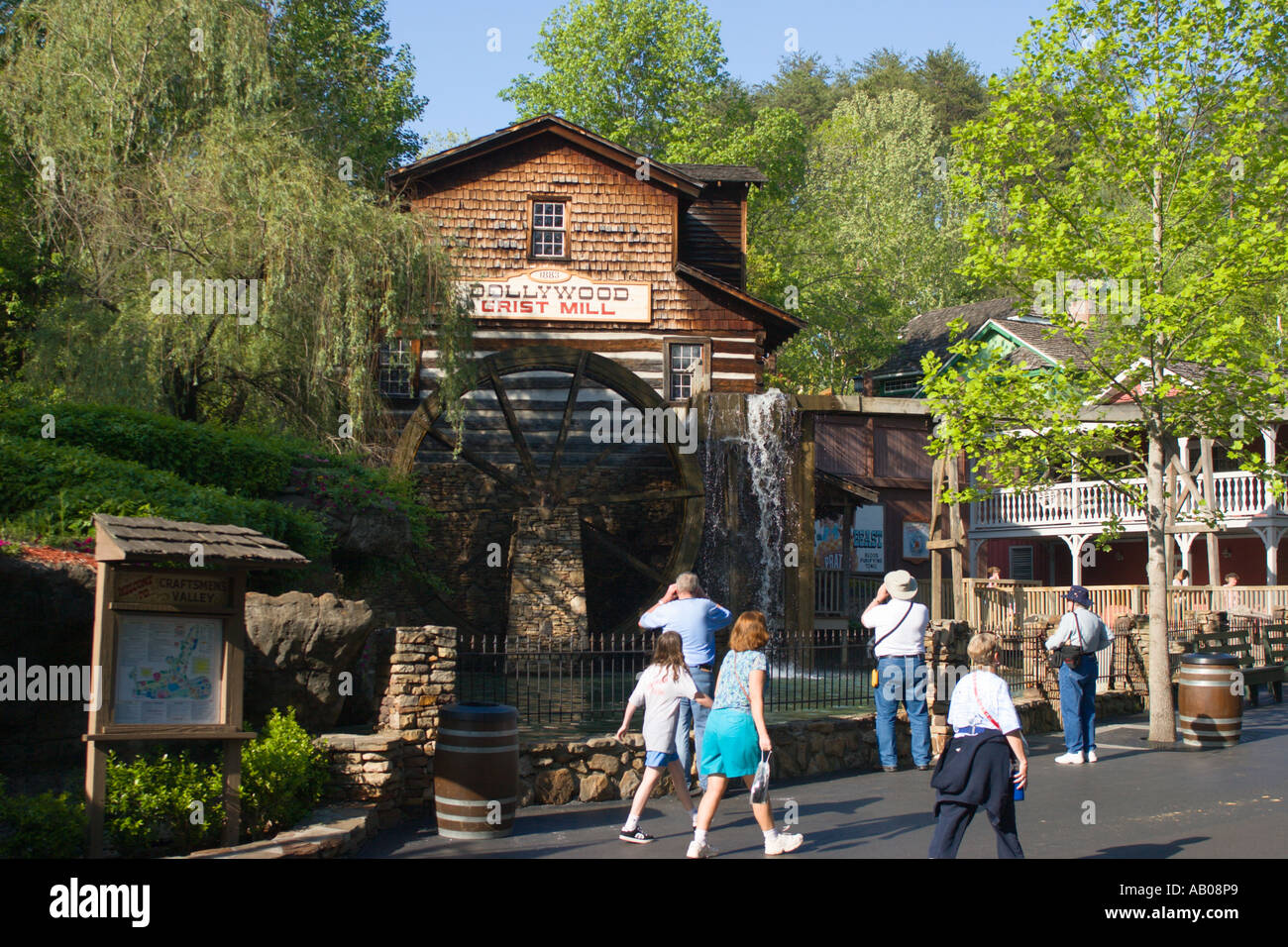 Park guests photograph the working Grist Mill at Dollywood theme park in Pigeon Forge, Tennessee ...