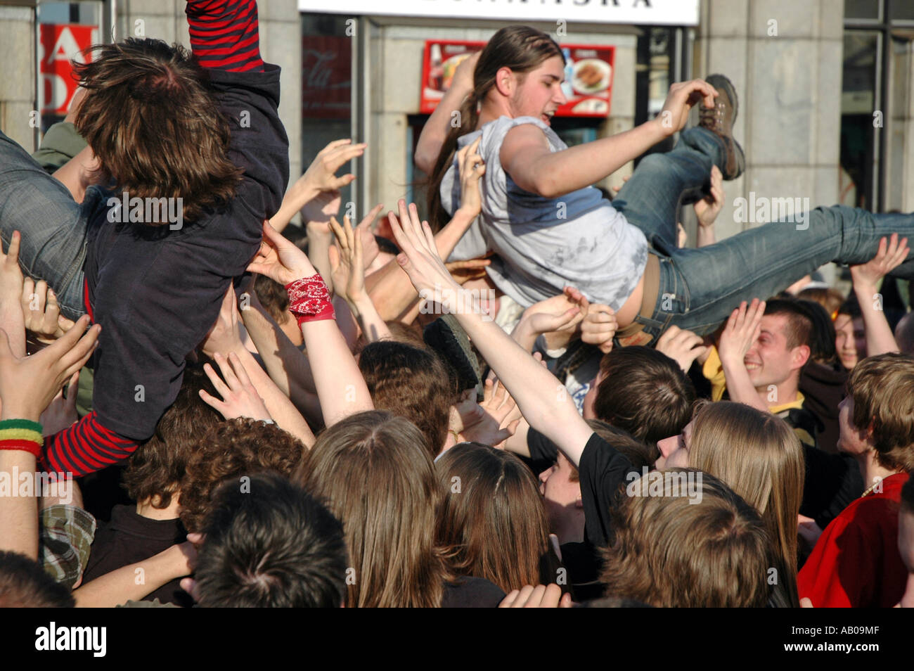 Young people on rock music concert Stock Photo - Alamy