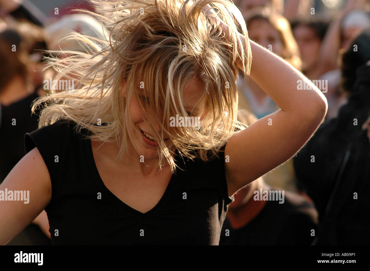 Woman dancing outdoor rock concert hi-res stock photography and images ...
