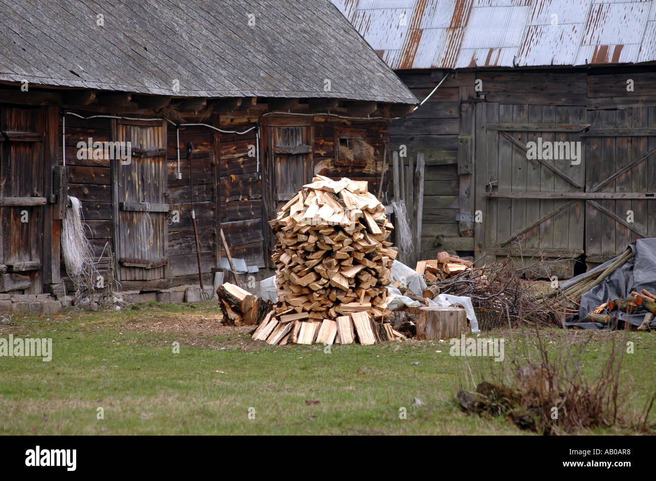 backyard with old wooden buildings on polish countryside Stock Photo ...