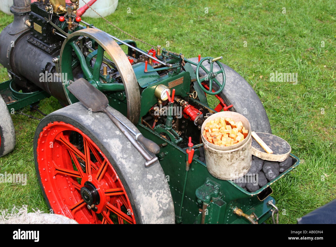 Firebox end of scale model steam traction engine showing cut wood and ...