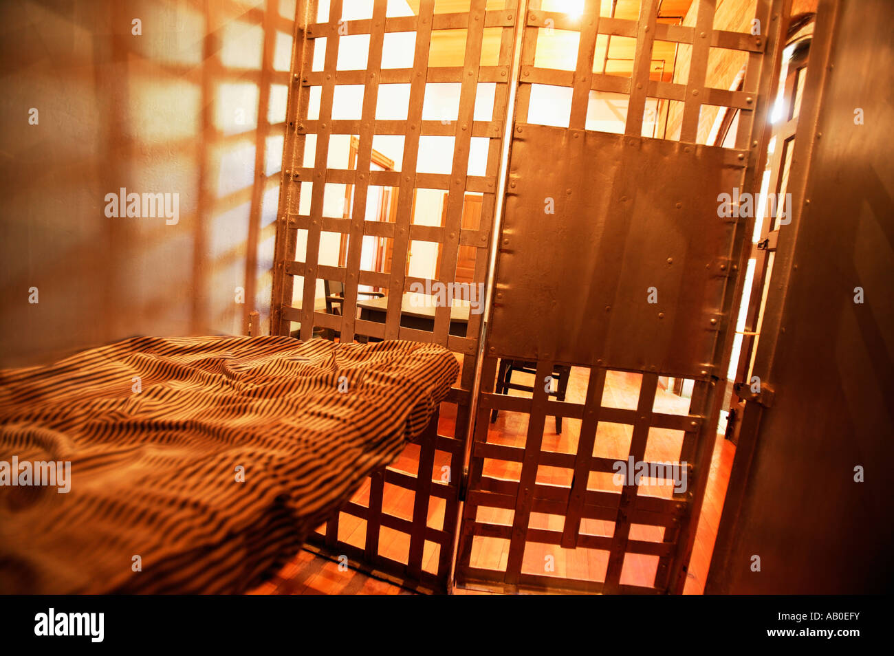 Empty jail cell Stock Photo - Alamy