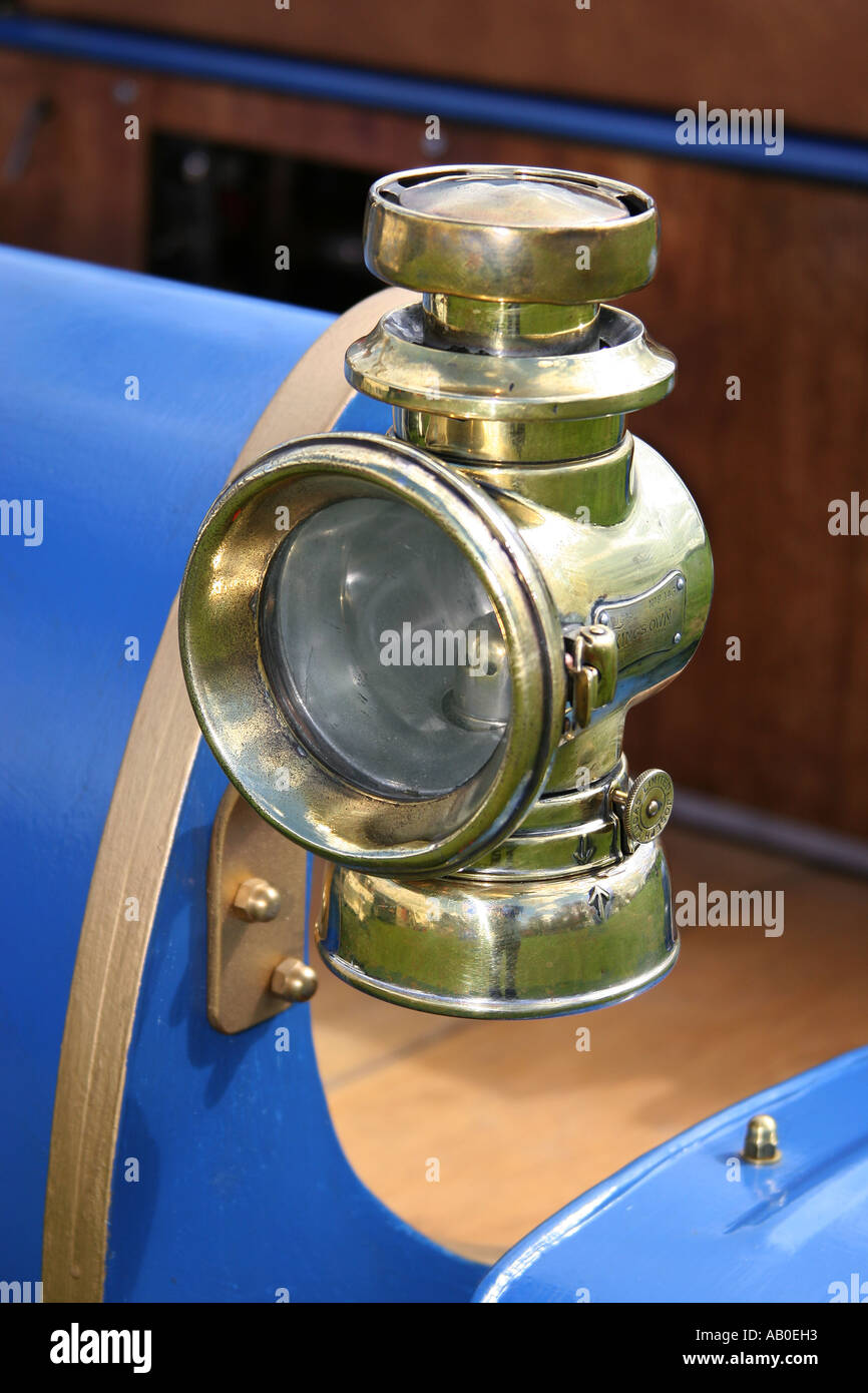 Brass oil lamp mounted on replica steam powered car Stock Photo - Alamy
