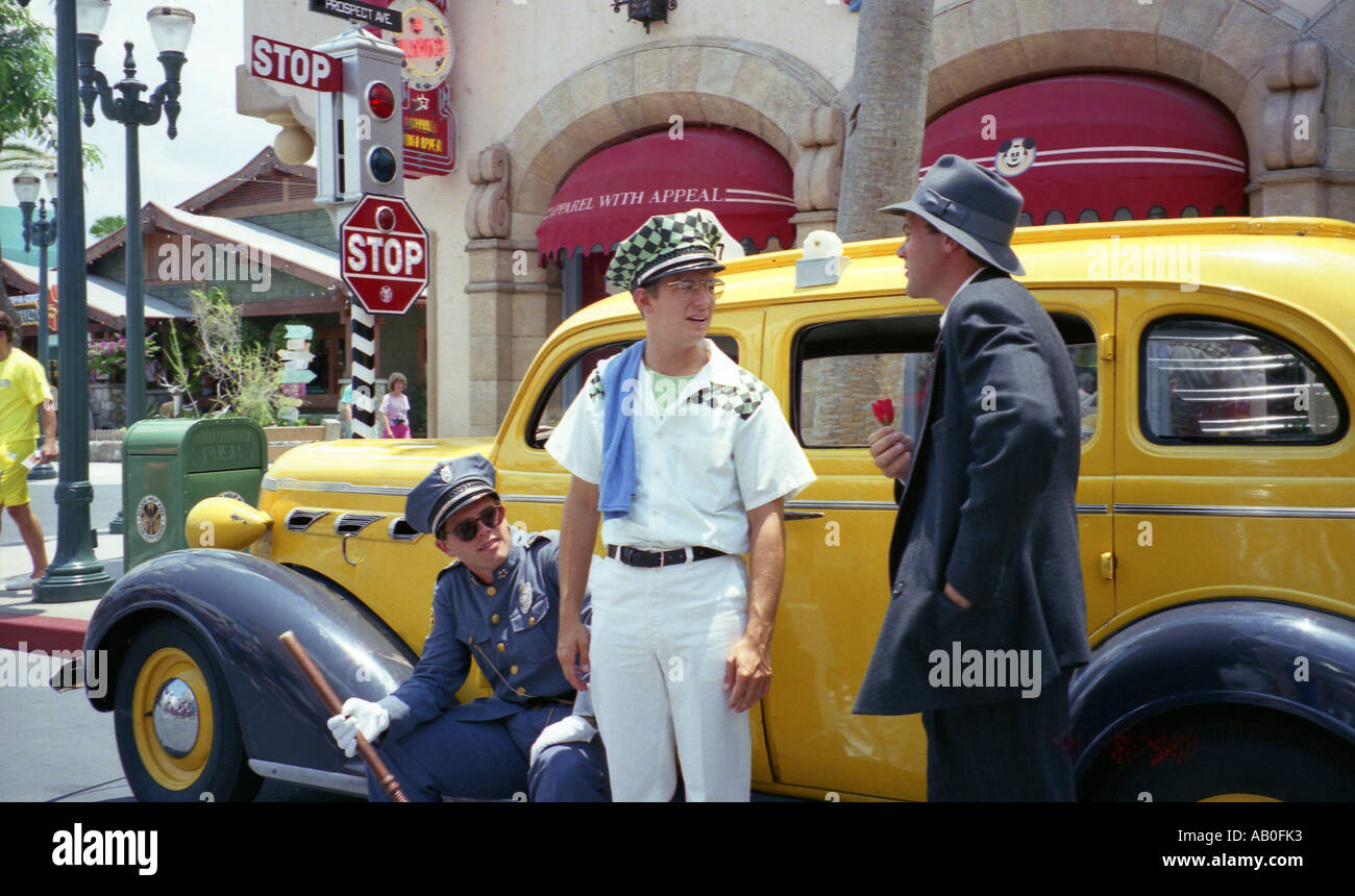 Actors playing out a scene in the street at the MGM studios at the ...
