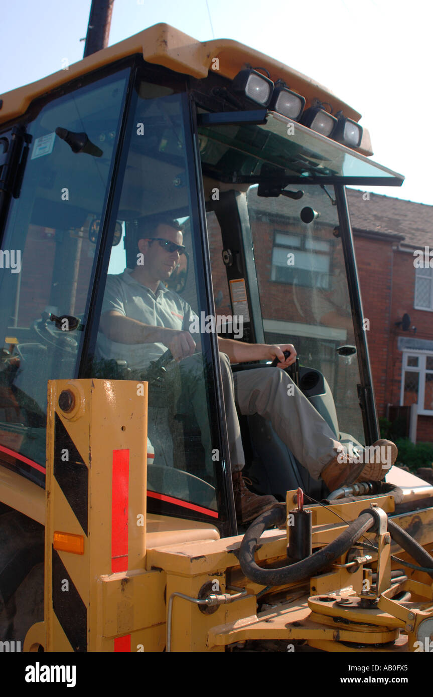 Man Operating A Digger Stock Photo - Alamy