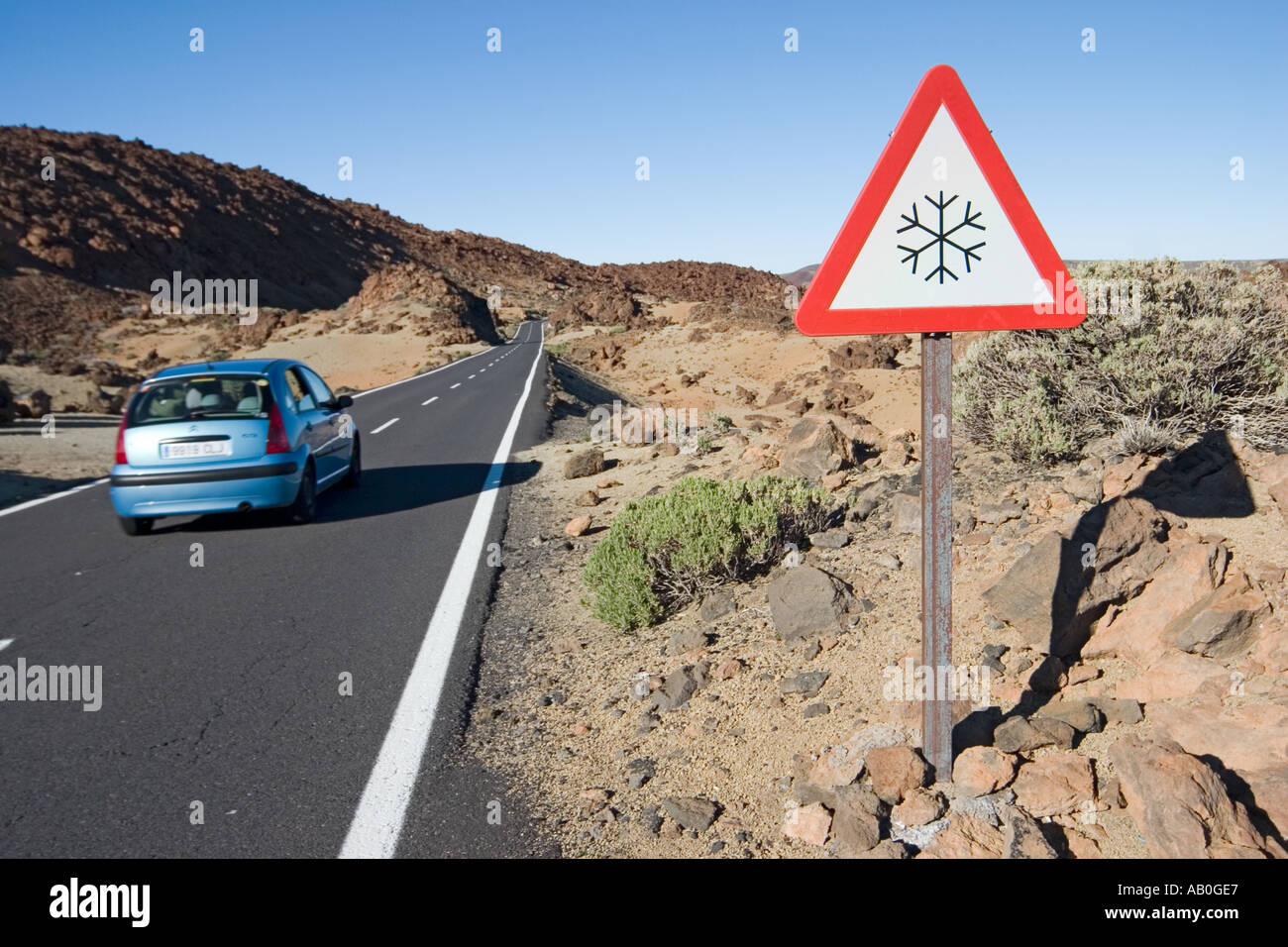 Snow road sign in desert terrain Mount Teide crater Parque Nacional del ...