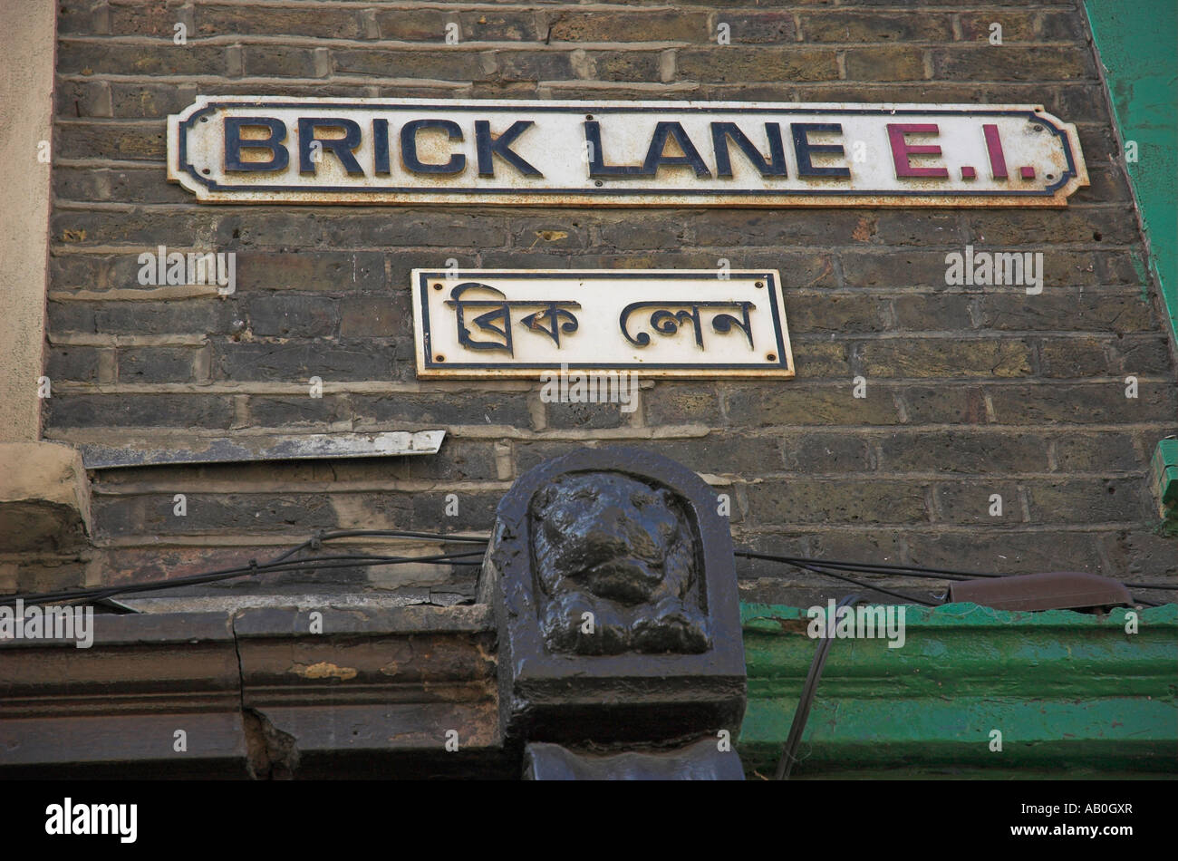 Brick Lane London street signs in both English and Arabic. London UK ...