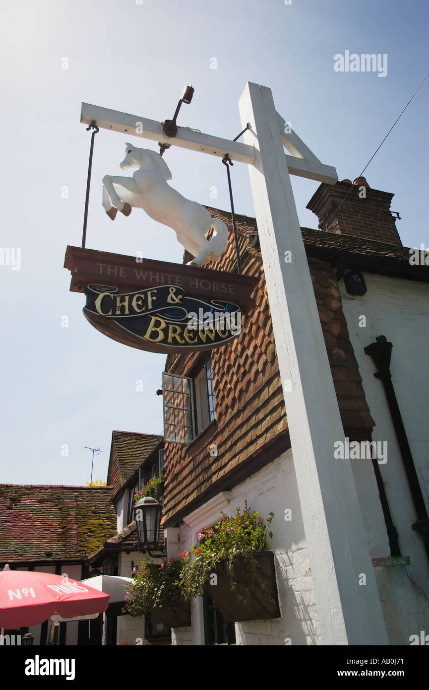 The White Horse Inn and sign in the British village of Shere in Surrey ...