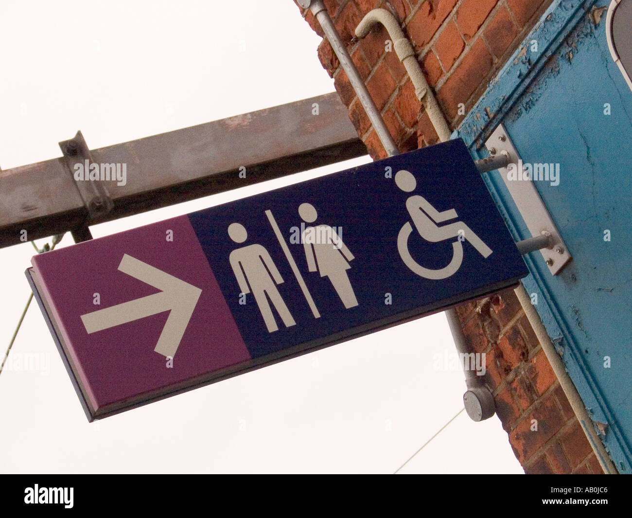 Sign to toilets Male female disabled wheelchair Stock Photo - Alamy
