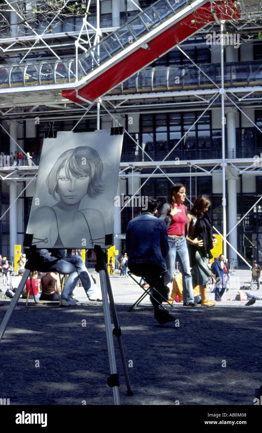 The work of portait artists outside the Pompidou centre in Paris France ...