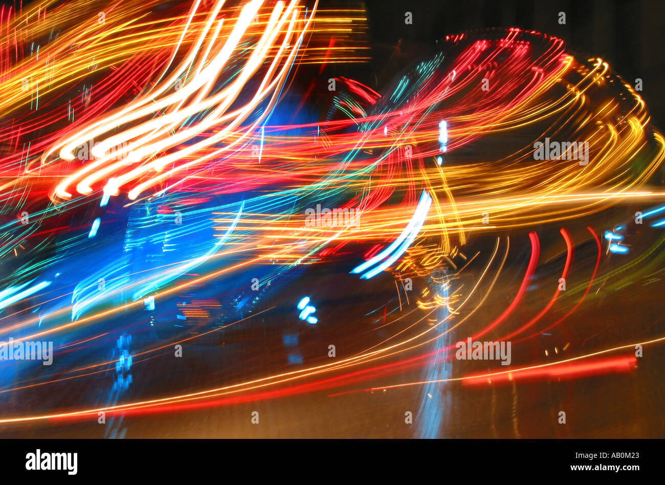 light streaks and colourful fairground lights in motion blur Stock ...