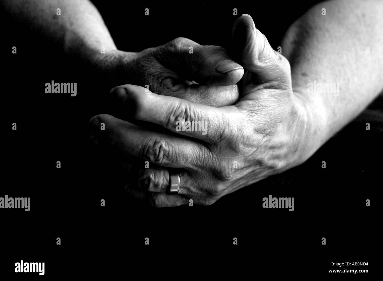one hand in other Stock Photo - Alamy