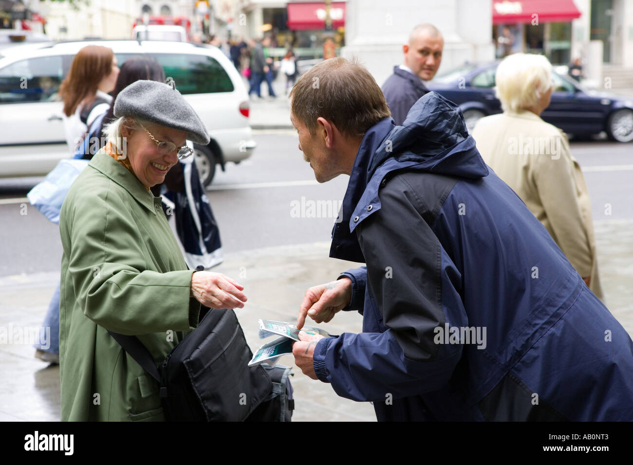 Male big issue seller hi-res stock photography and images - Alamy