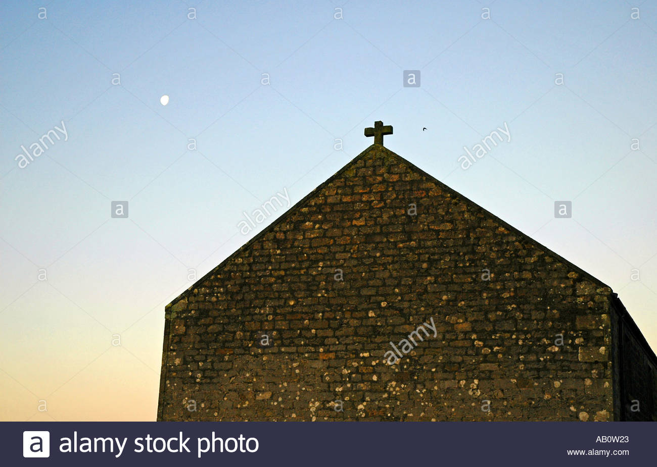 The side on view of a church building at dawn Stock Photo - Alamy