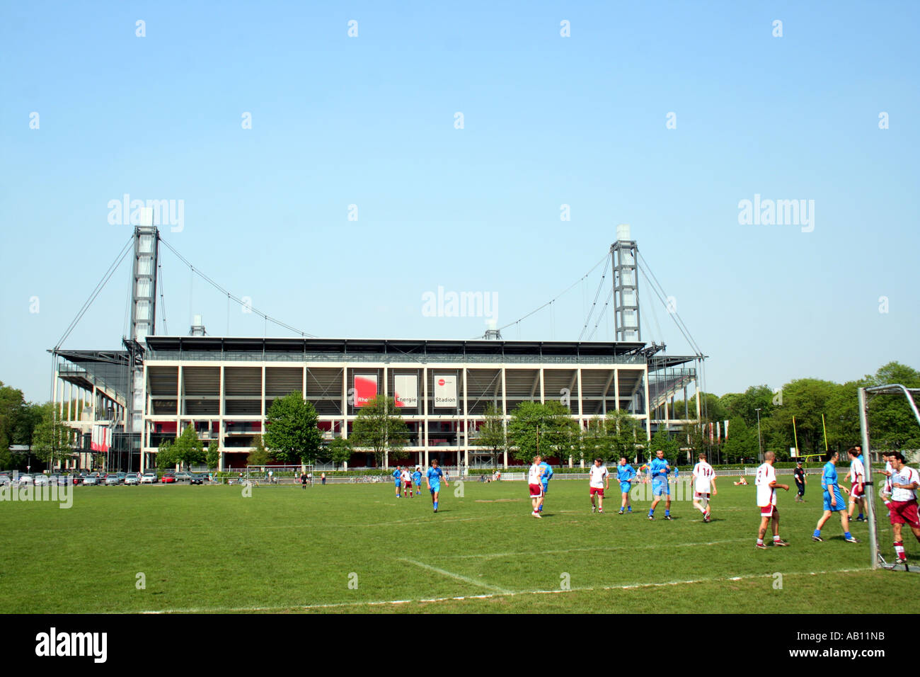 soccer players in front of Cologne Football Stadium Rhein Energie ...