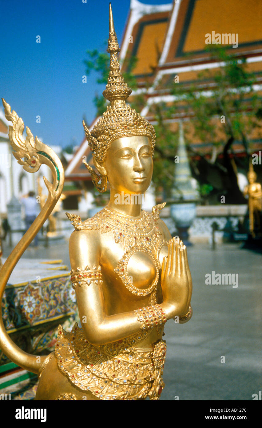 Golden statue of Apsonsi at Temple of the Emerald Buddha Grand Palace ...