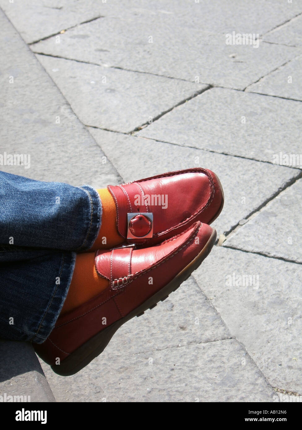 woman relaxing on steps Stock Photo - Alamy