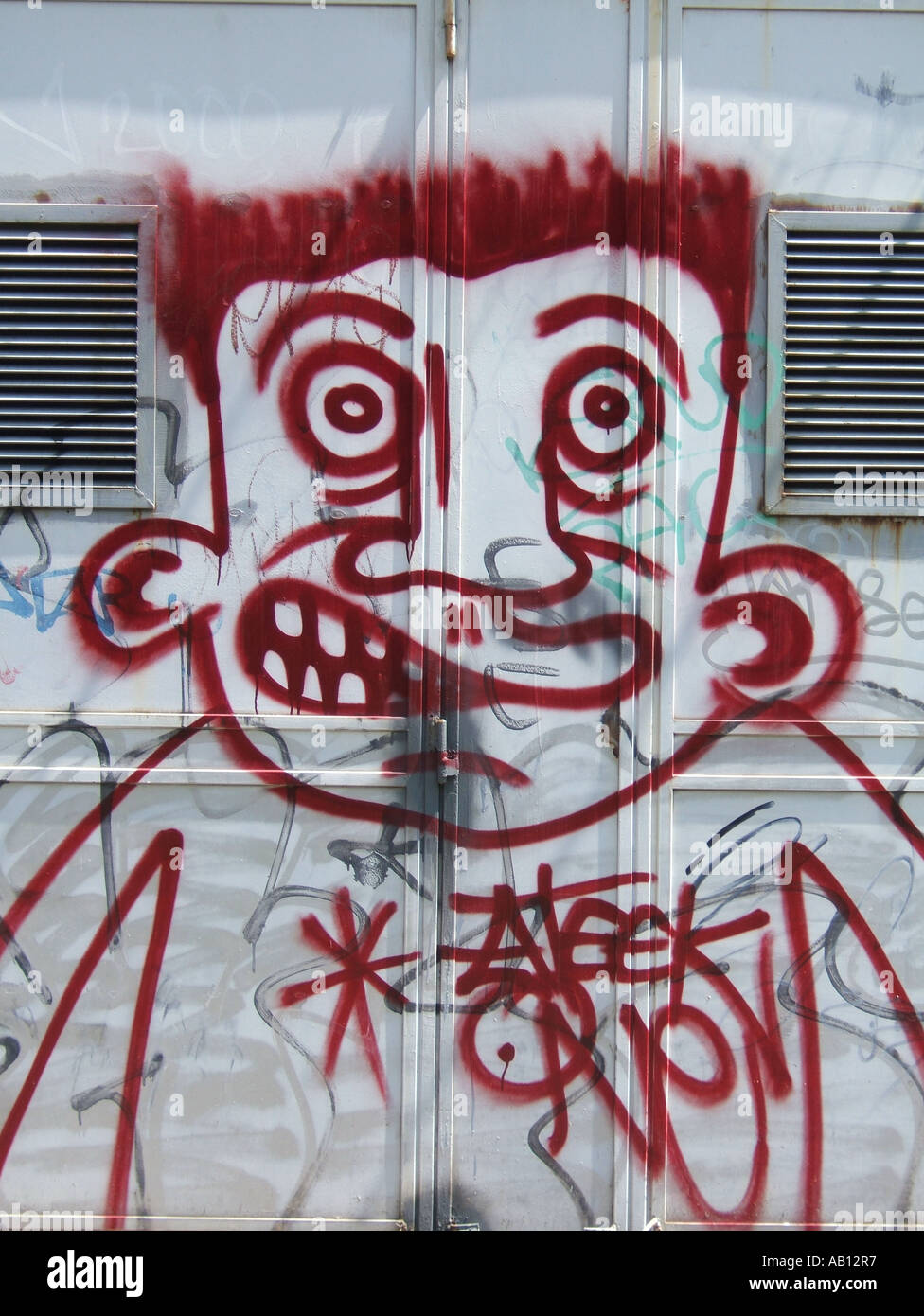 Sad face graffiti on wall hi-res stock photography and images - Alamy