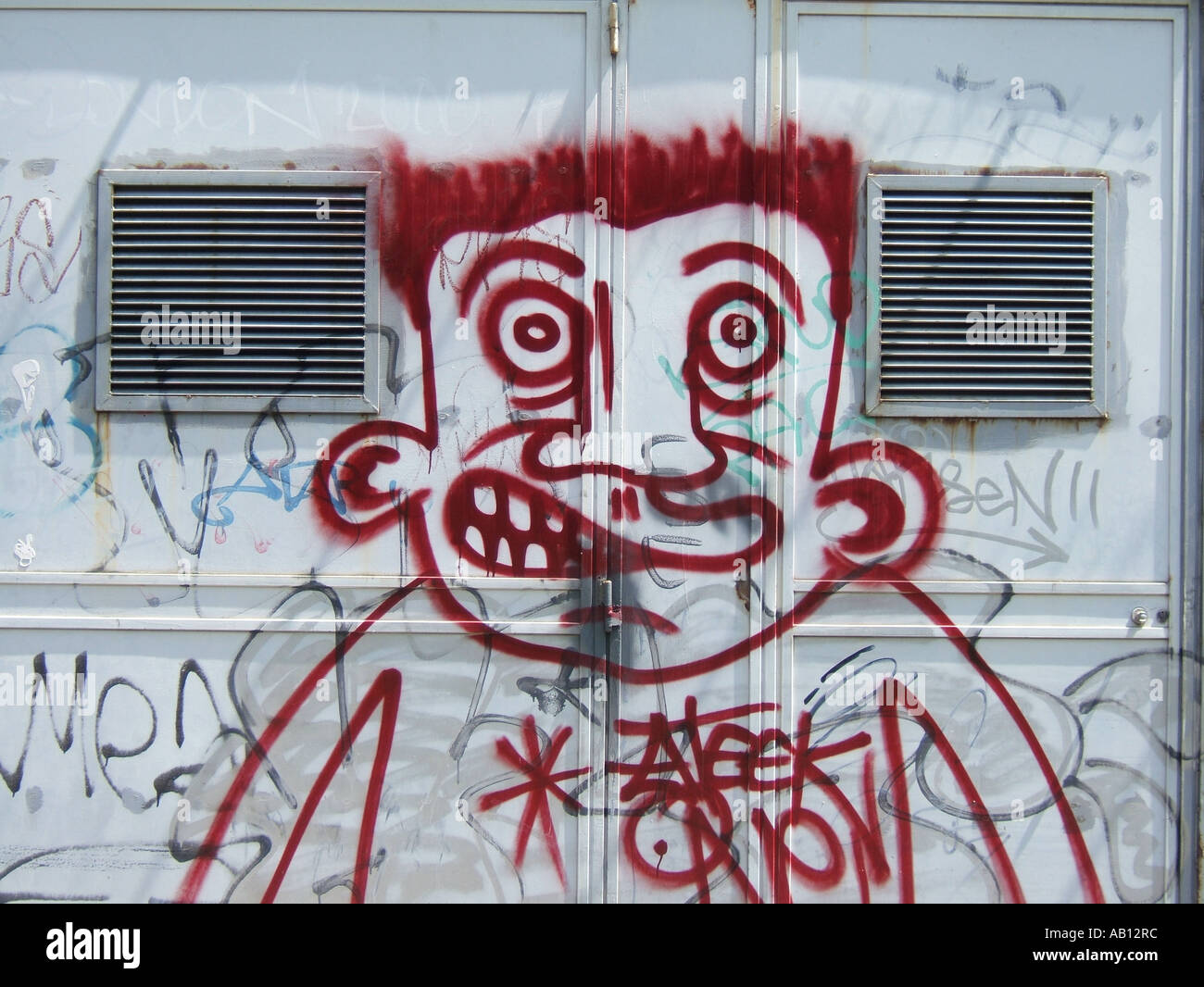 urban city scene graffiti on garage door Stock Photo - Alamy