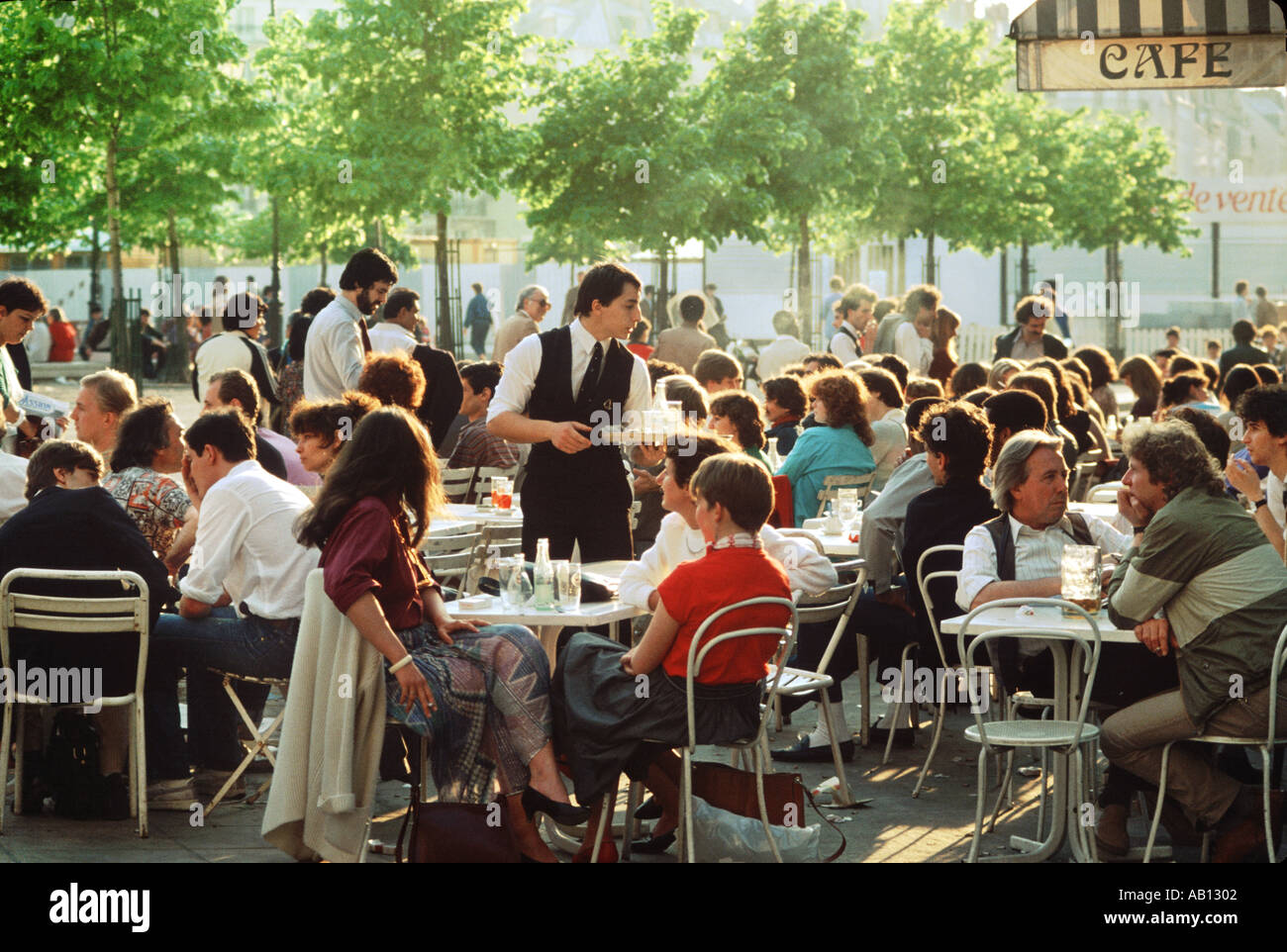 people in a cafe Paris France Stock Photo - Alamy