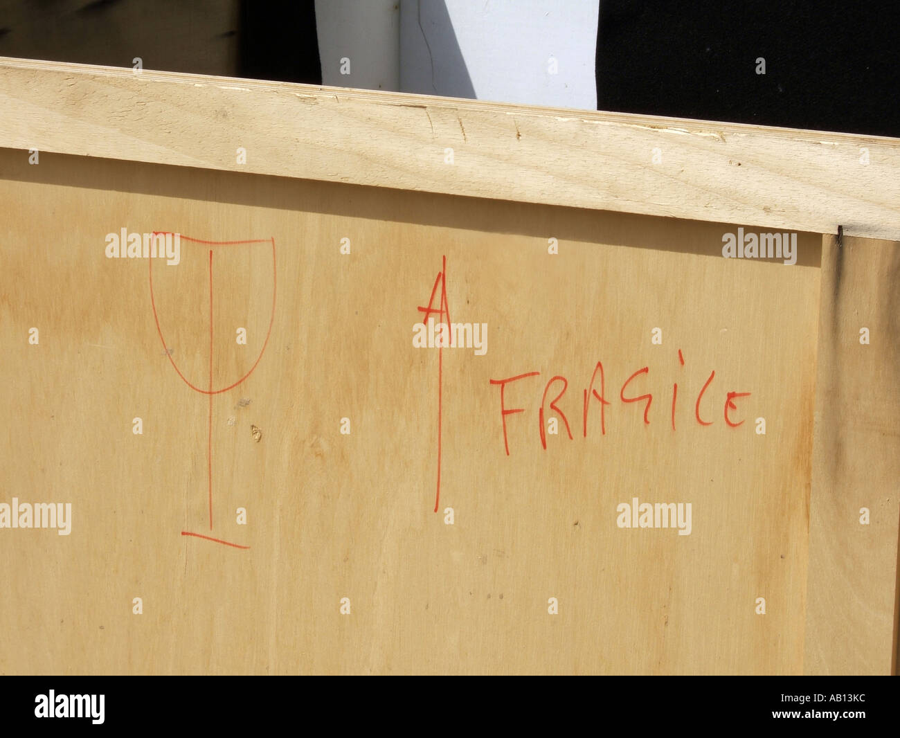 fragile hand written on wooden case Stock Photo - Alamy
