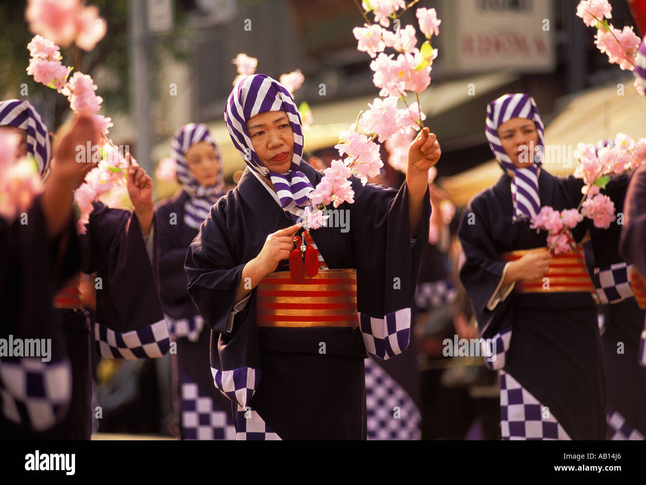 Women dance with cherry blossoms at the festival of the 47 Samurai in ...