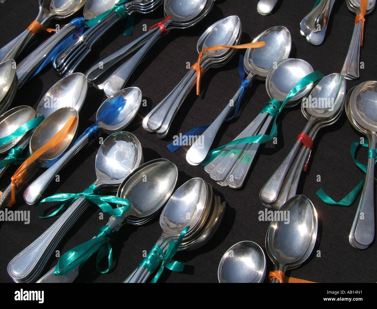 selection of spoons for sale in market Stock Photo - Alamy