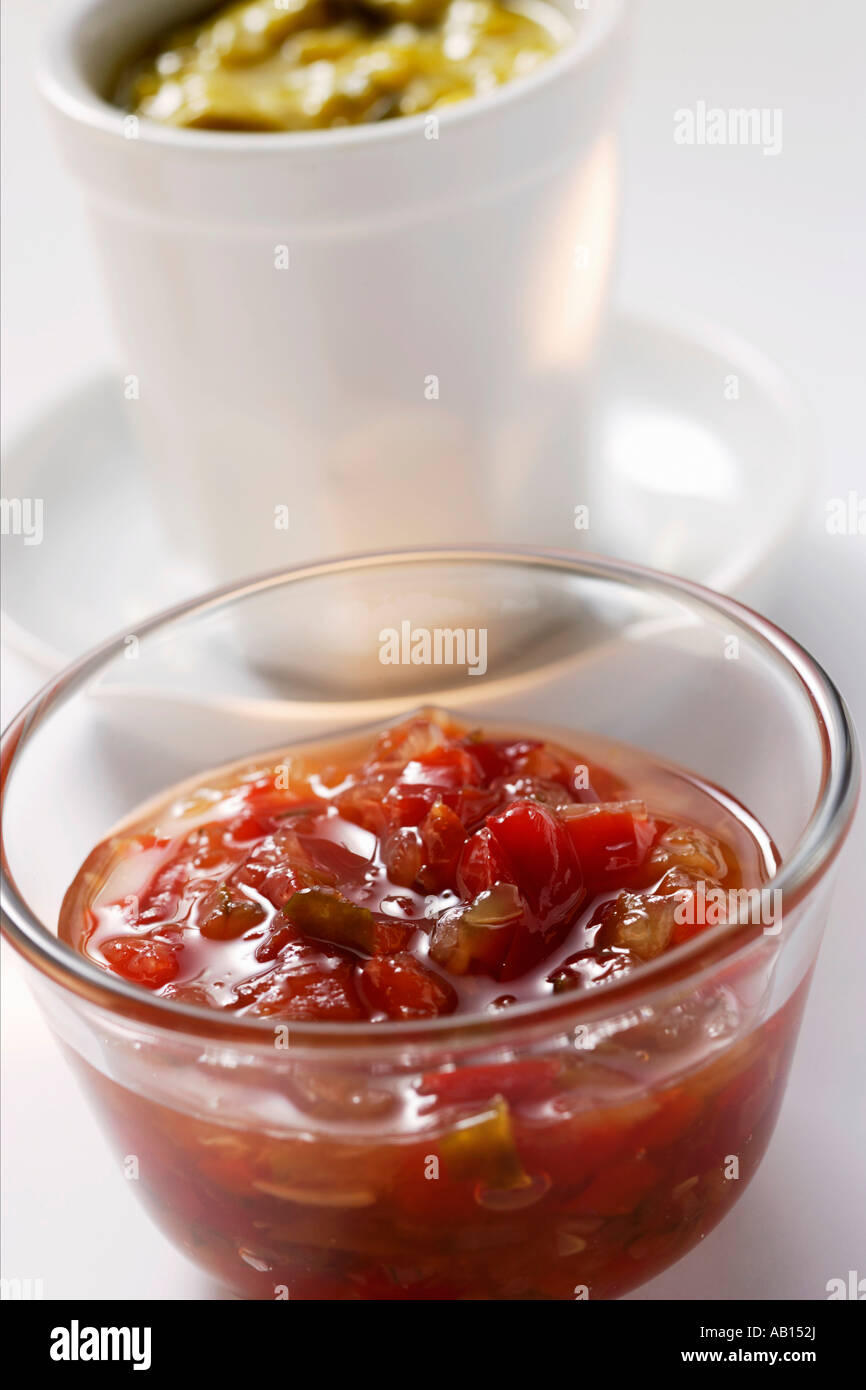 Pepper relish in small bowl mustard relish behind it FoodCollection ...