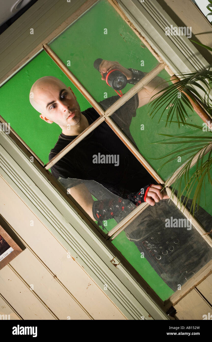 Sinister man in house hi-res stock photography and images - Alamy