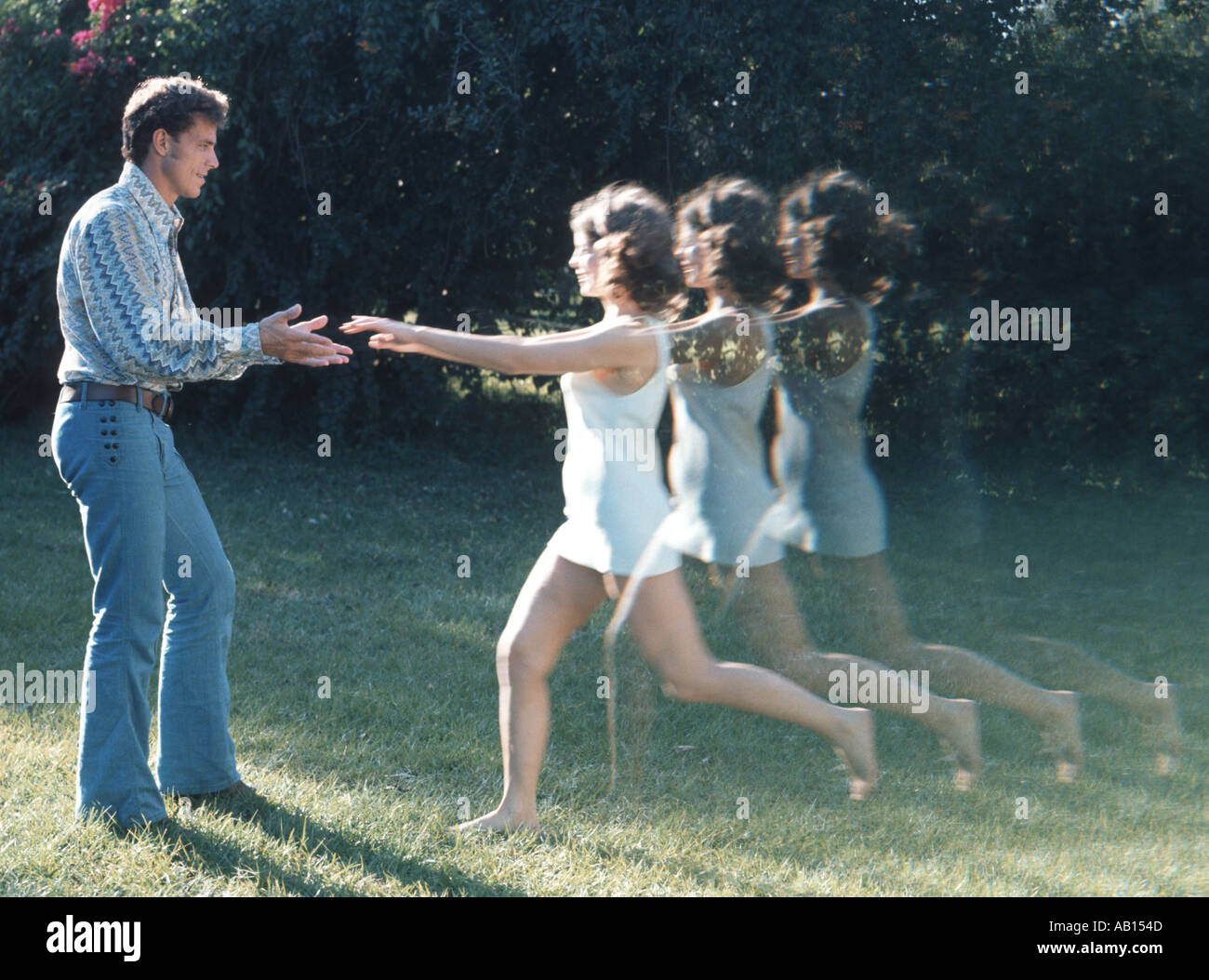 girl running toward boyfriend with strobe special effect Stock Photo ...
