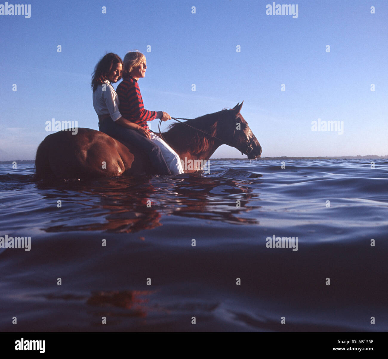 Couple riding horse bareback in hi-res stock photography and images - Alamy