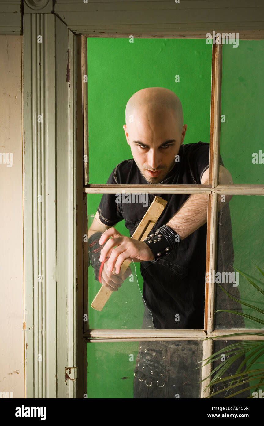 Sinister man in house hi-res stock photography and images - Alamy