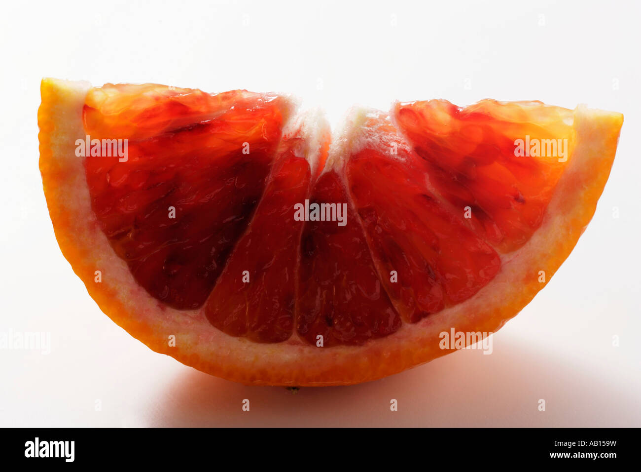 Wedge of blood orange FoodCollection Stock Photo - Alamy