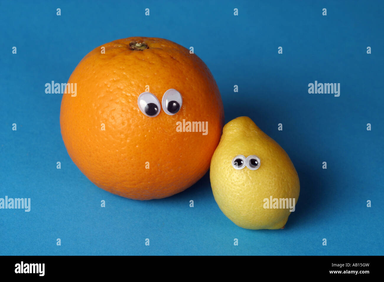 Orange mummy with baby lemon Stock Photo - Alamy