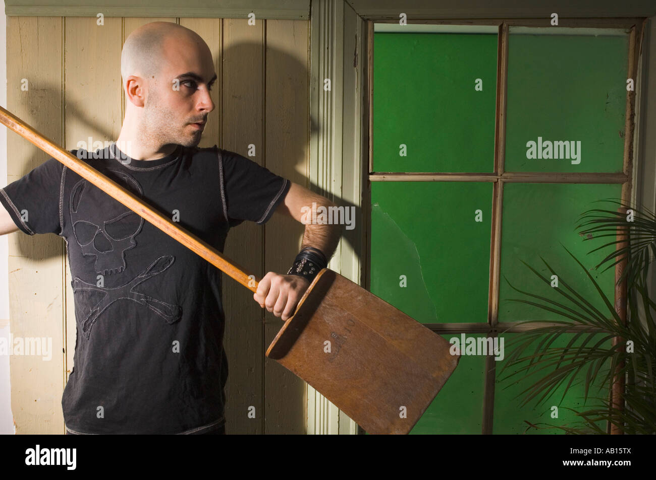 Sinister and angry character illuminated by harsh lighting Stock Photo ...