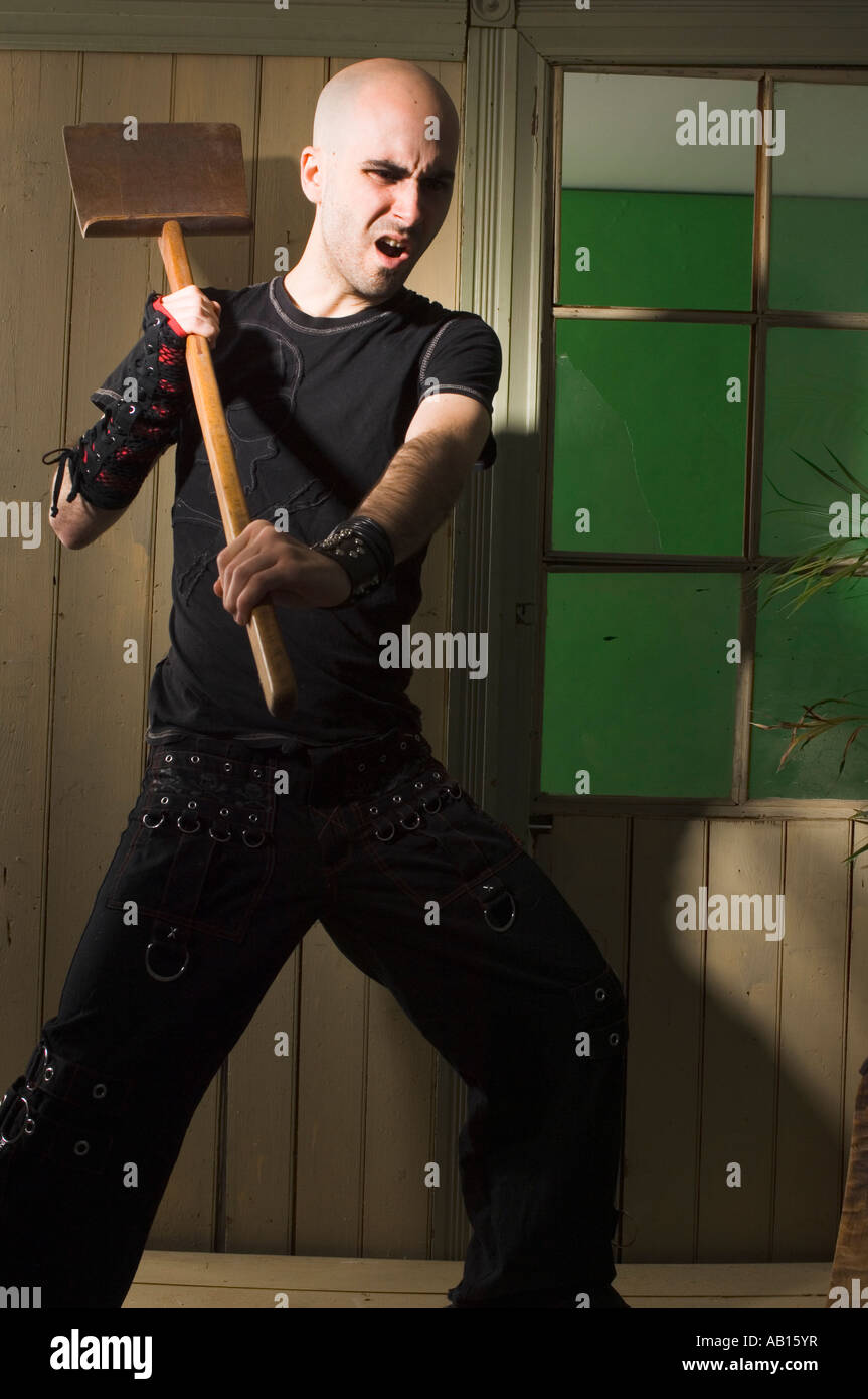 Sinister and angry character illuminated by harsh lighting Stock Photo ...