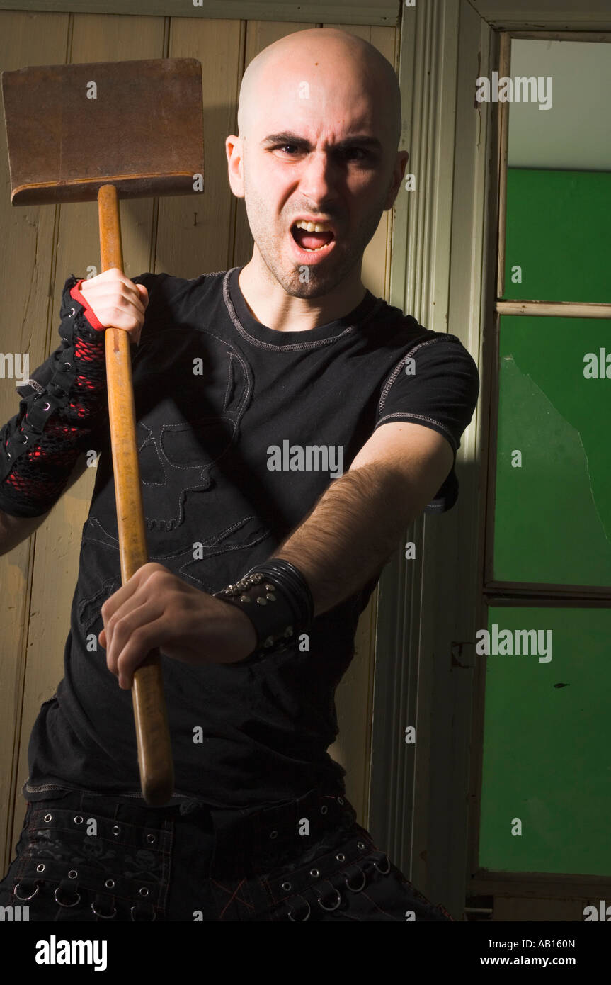 Sinister and angry character illuminated by harsh lighting Stock Photo ...