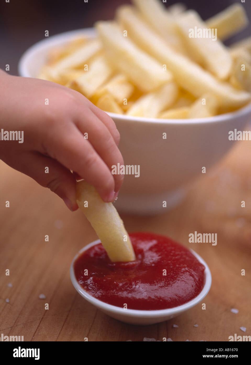 Child fries fingers hi-res stock photography and images - Alamy